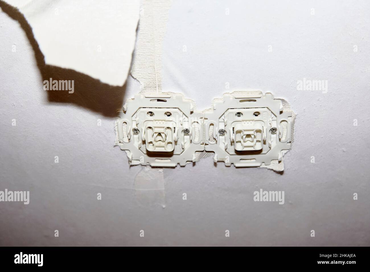 Electrical sockets and switches during repair. Preparing the wall for ...