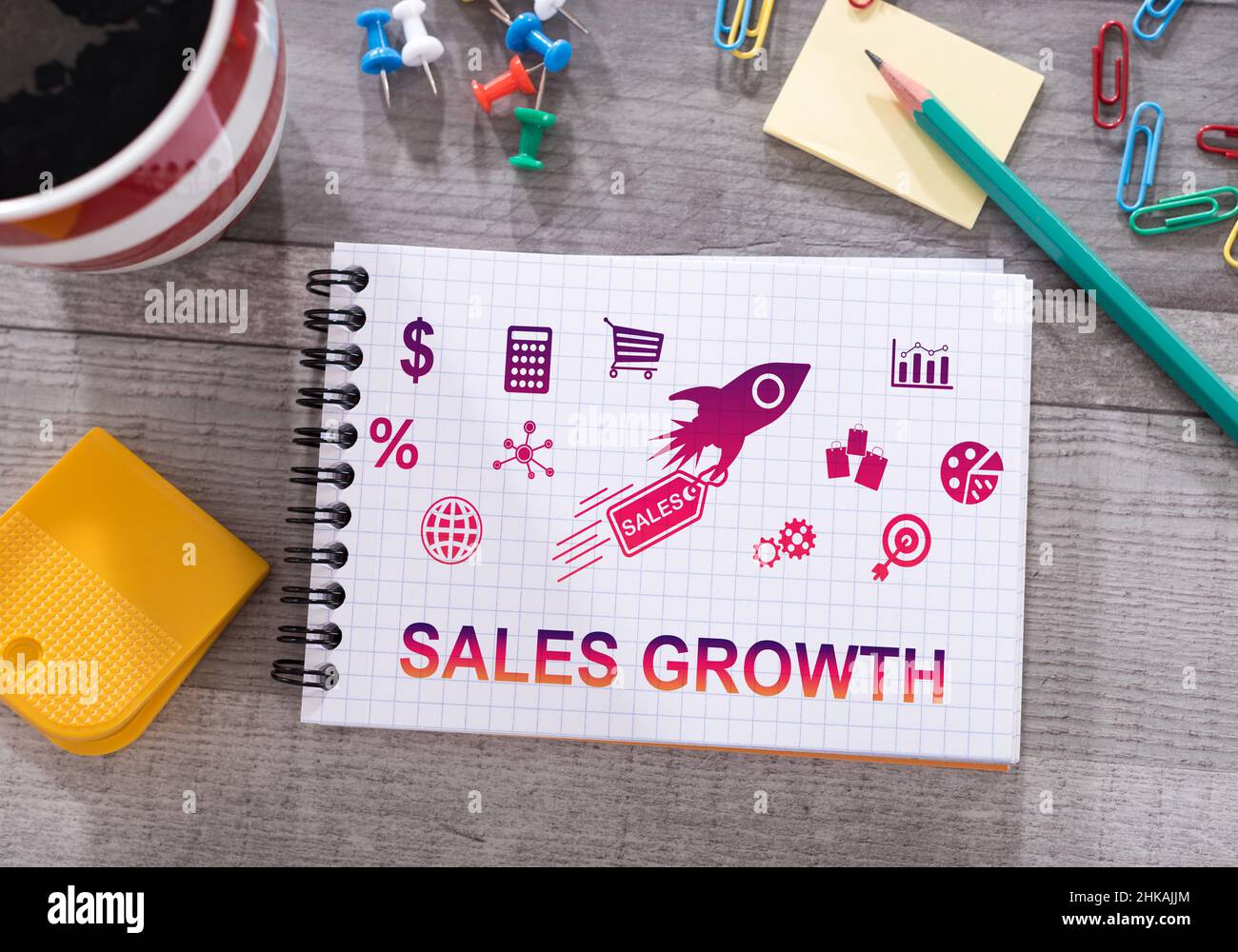 Sales growth concept drawn on a notepad placed on a desk Stock Photo ...