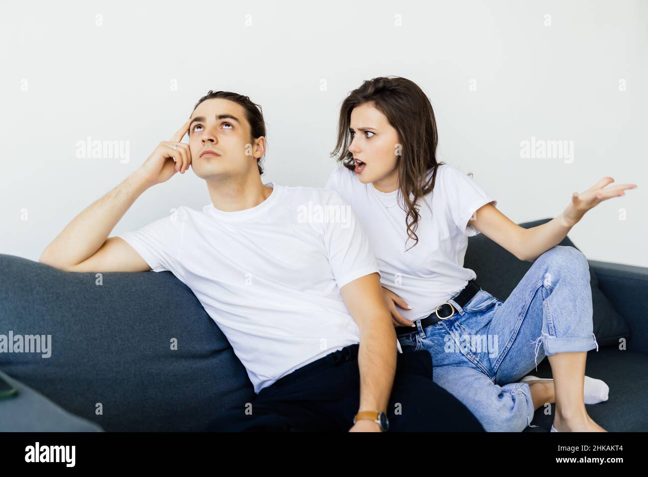 Stressed married family couple arguing emotionally, blaming lecturing ...