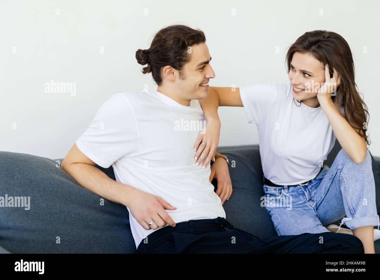 Loving happy couple talking to each other at home Stock Photo - Alamy