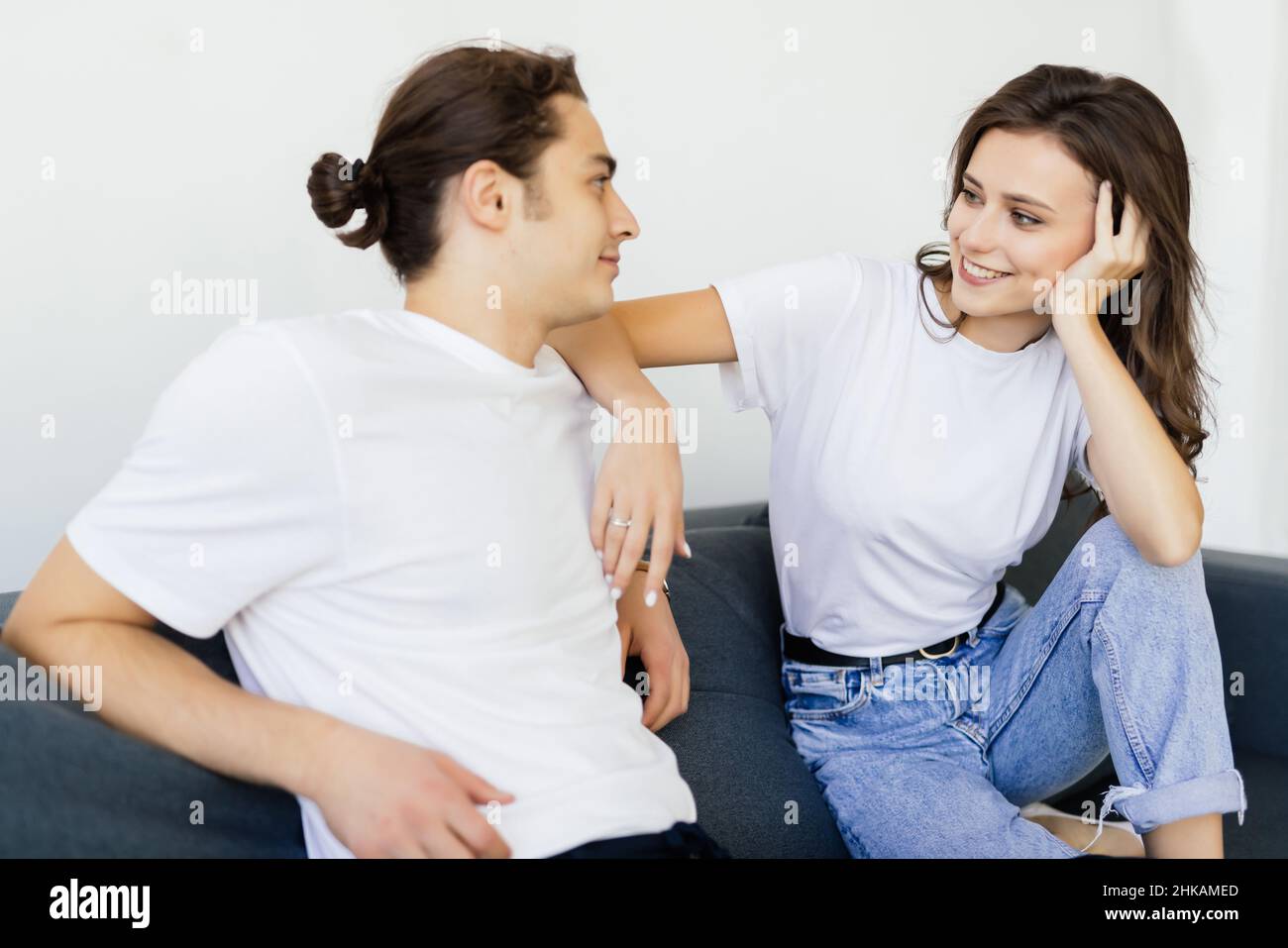 Loving happy couple talking to each other at home Stock Photo - Alamy