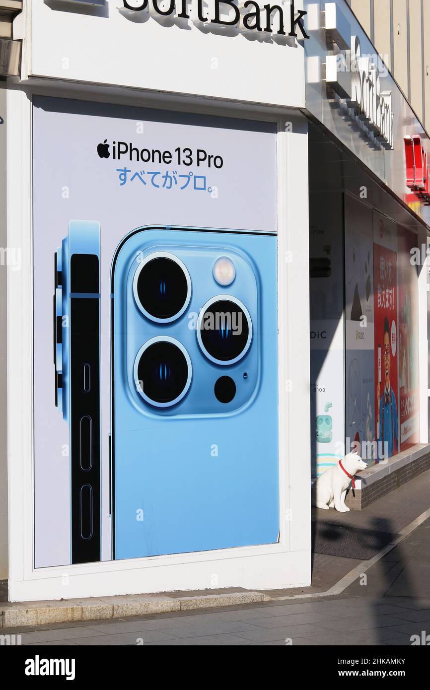 TOKYO, JAPAN - February 3, 2022: Poster advertising the iPhone 13 pro ...