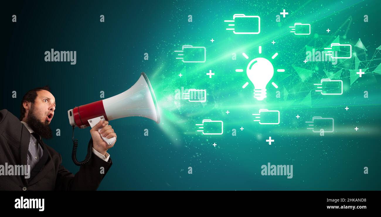 Young person with megaphone and technology related icon Stock Photo - Alamy