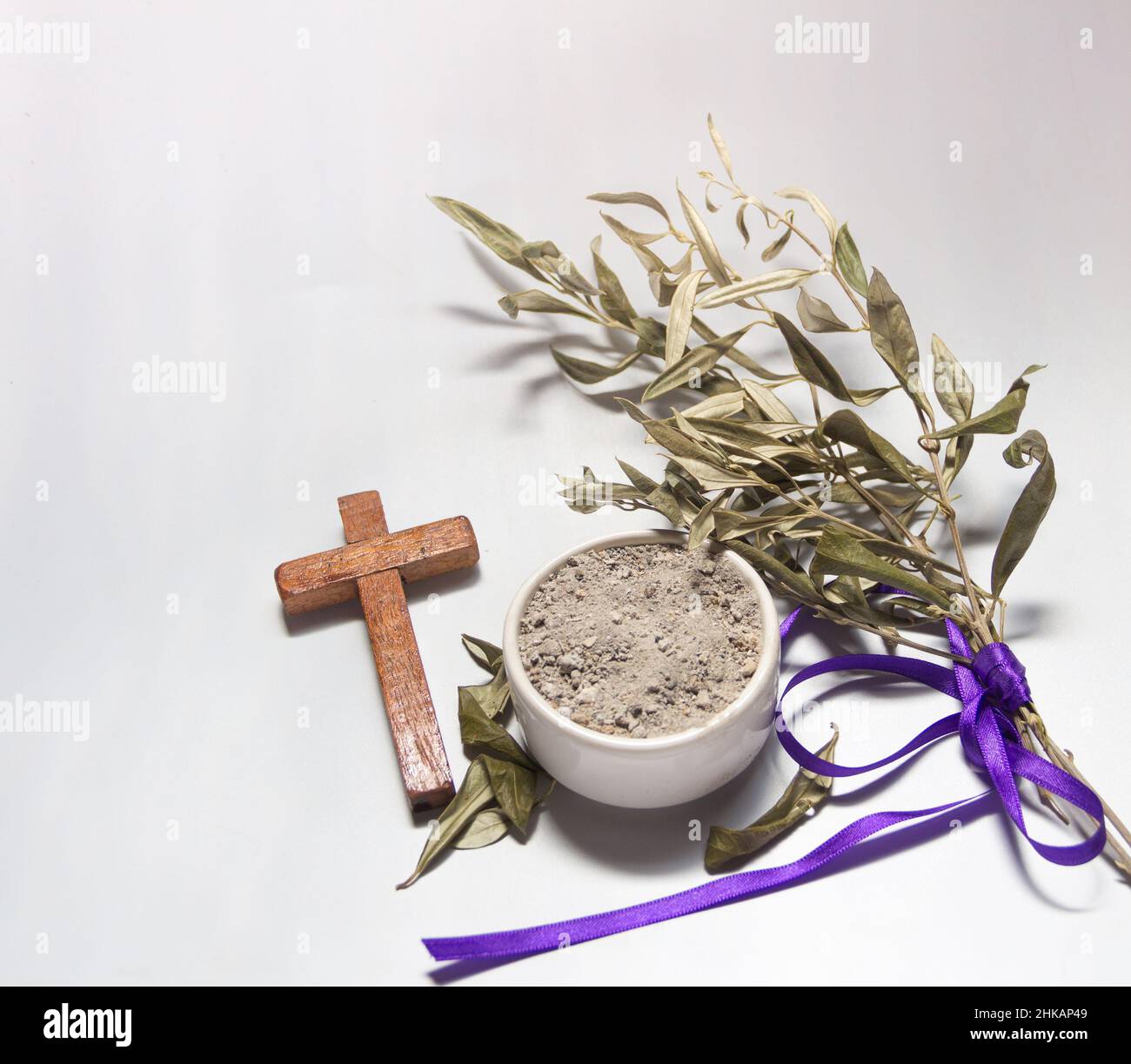 bowl with ashes and olive branch. ash wednesday concept Stock Photo - Alamy