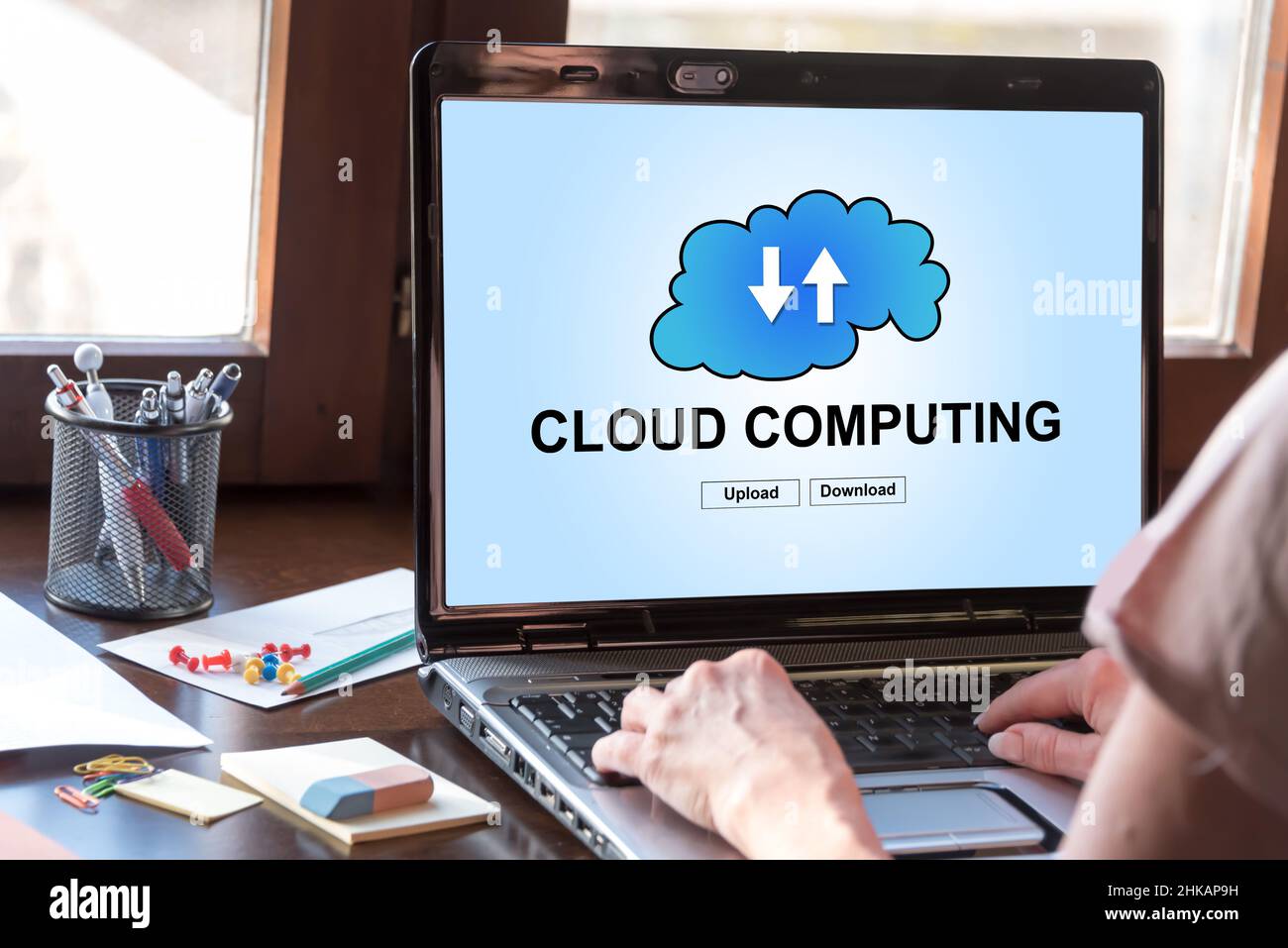 Laptop screen displaying a cloud computing concept Stock Photo - Alamy