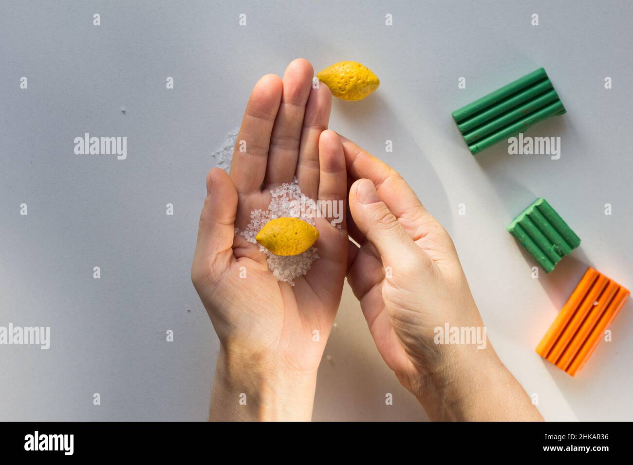 Small lemon made from polymer clay with sea salt to make dents as on ...