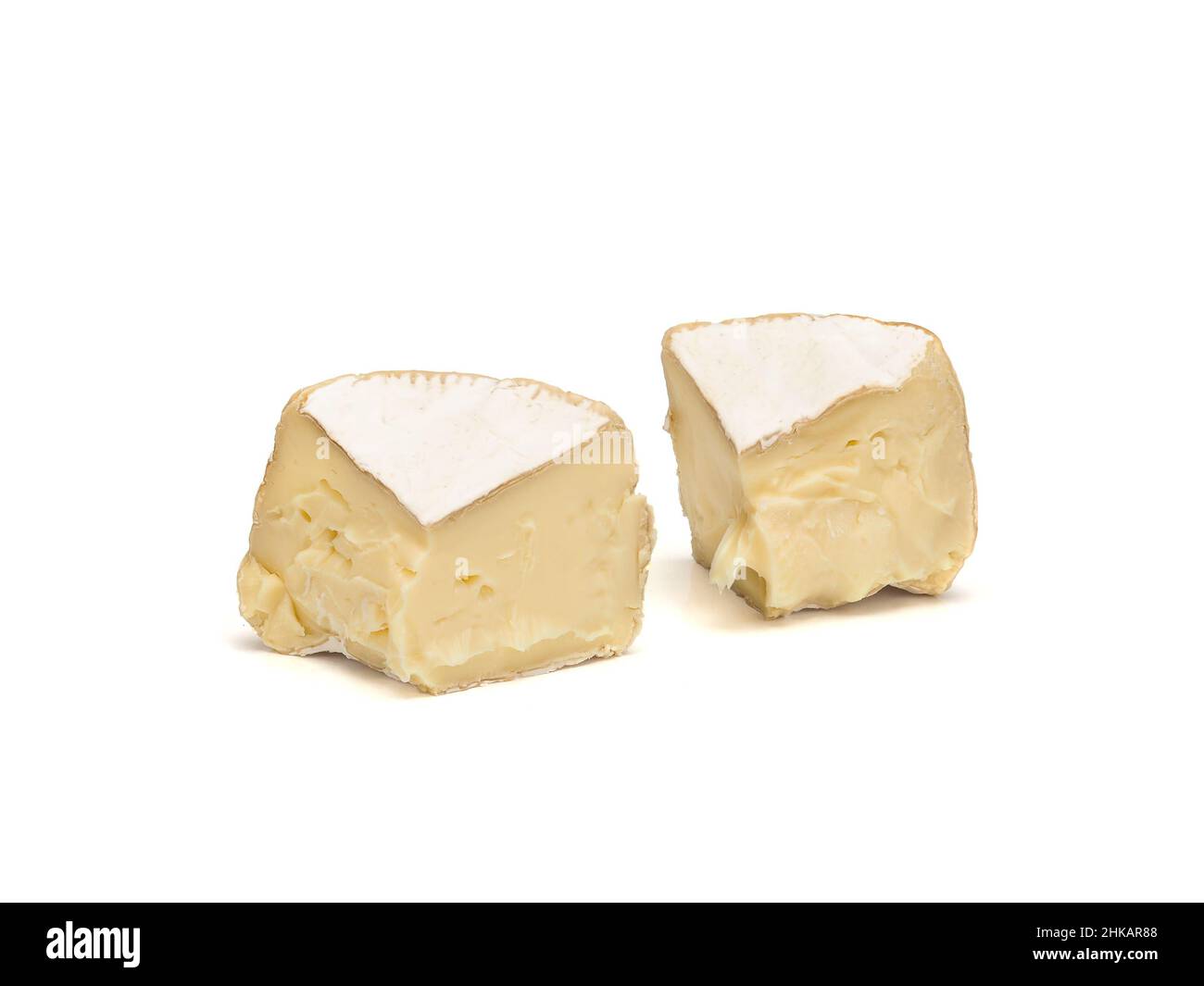 two pieces of fresh brie cheese isolated on white background Stock ...