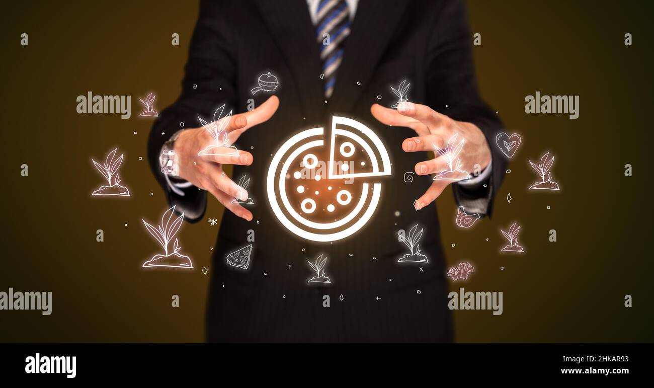 Hand holding food related icons Stock Photo - Alamy