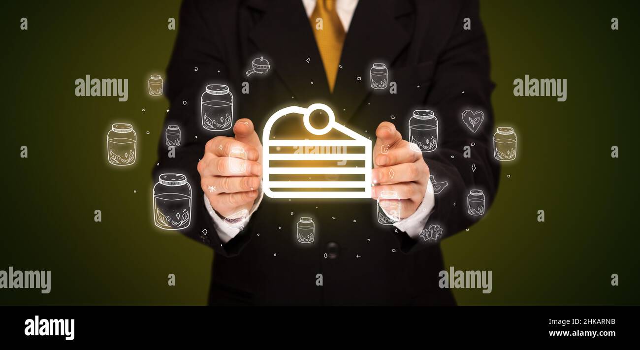 Hand holding food related icons Stock Photo - Alamy