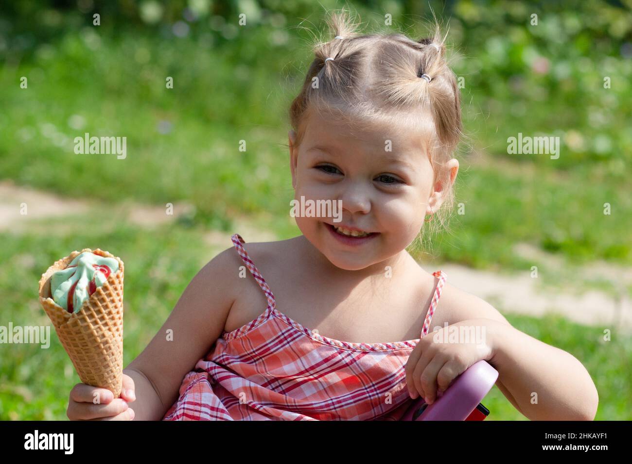 Happy Smiling Little Girl In Summer Park Stock Photo Alamy