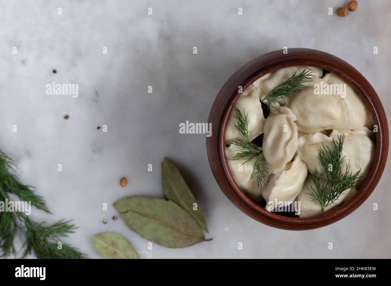 Cooked russian pelmeni meat dumplings in pot Stock Photo - Alamy