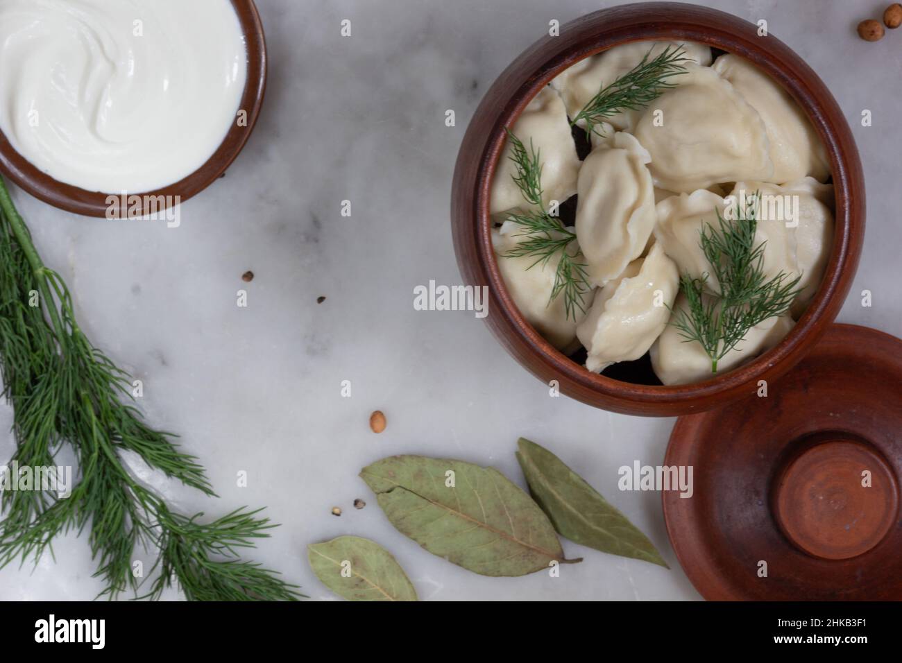 Cooked russian pelmeni meat dumplings in pot Stock Photo - Alamy
