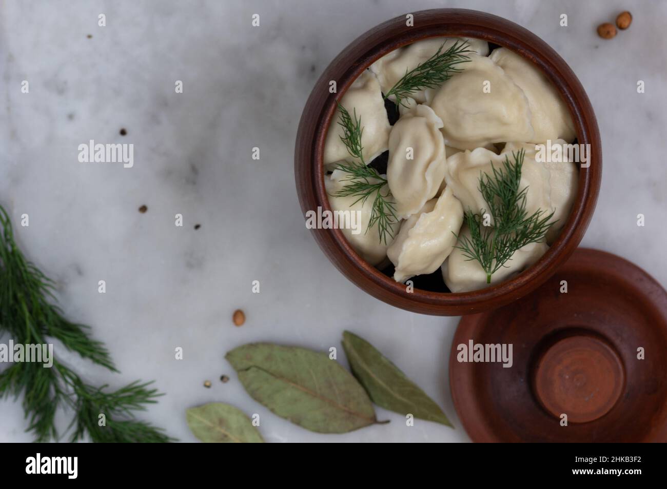 Cooked russian pelmeni meat dumplings in pot Stock Photo - Alamy