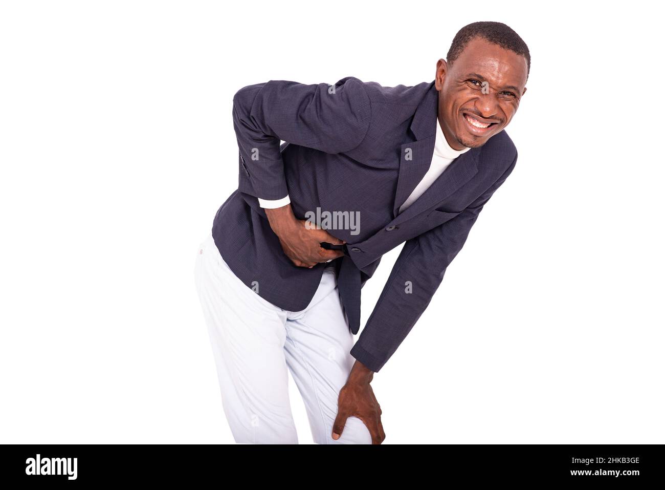 adult businessman suffering from stomach ache with hand on stomach ...