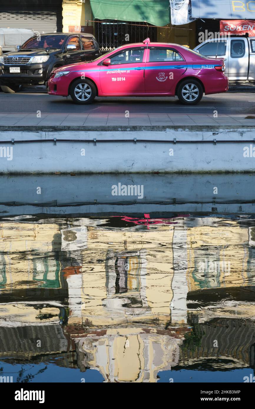 Reflections of an old European-style building in Klong (canal) Lod ...