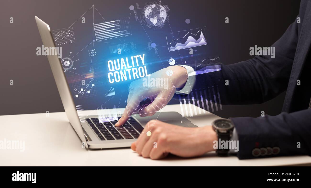 Businessman working on laptop, business concept Stock Photo - Alamy