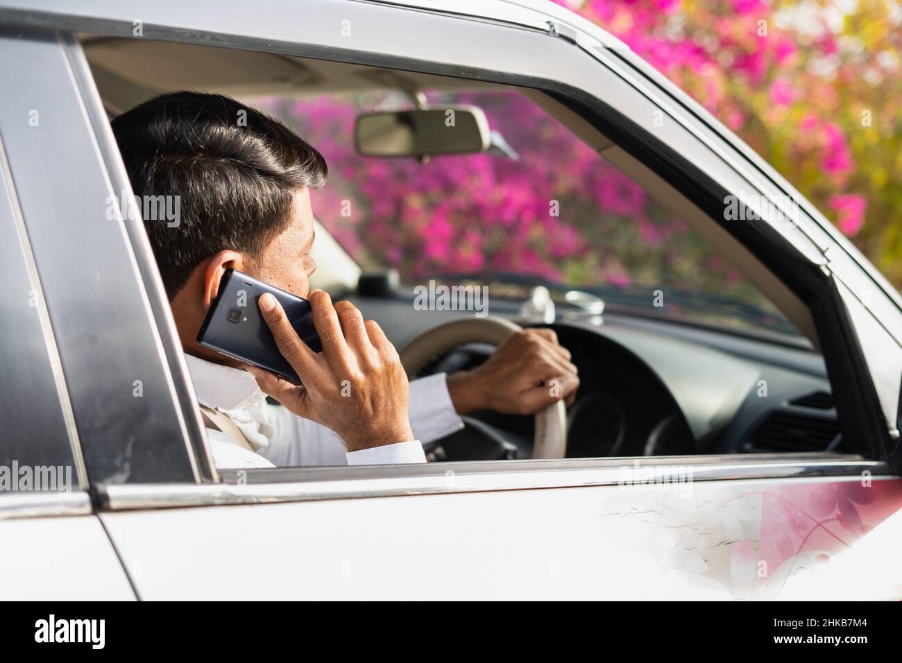 Indian family talking on mobile hi-res stock photography and images - Alamy