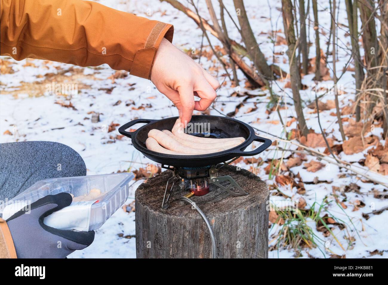 Camping food making. Tourist foods in outdoor activities. Sausages in ...