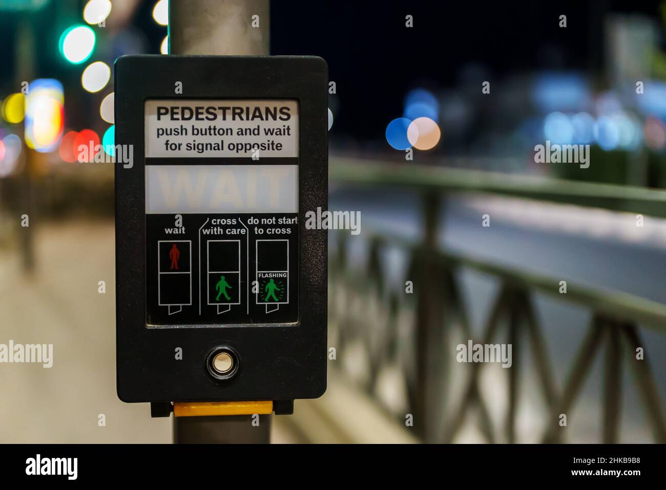 Modern pedestrian crossing button device on the street Stock Photo - Alamy