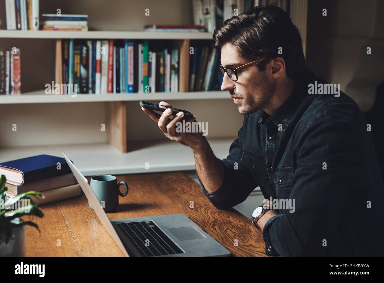 Making audio notes to help remember it all Stock Photo - Alamy