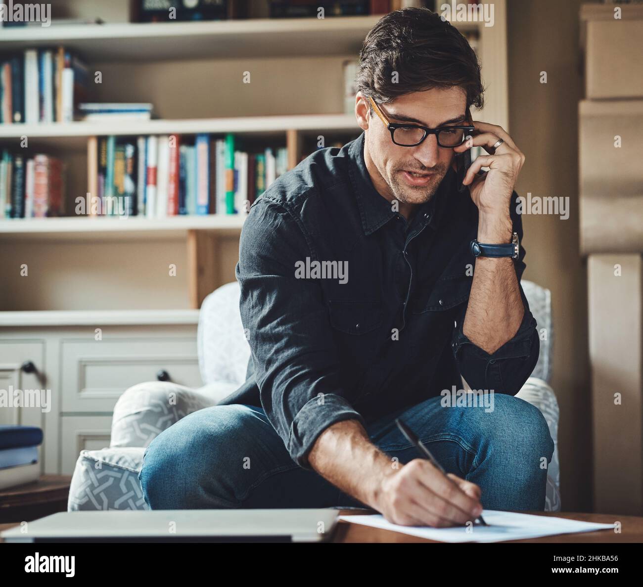 Young business man sorting out hi-res stock photography and images - Alamy
