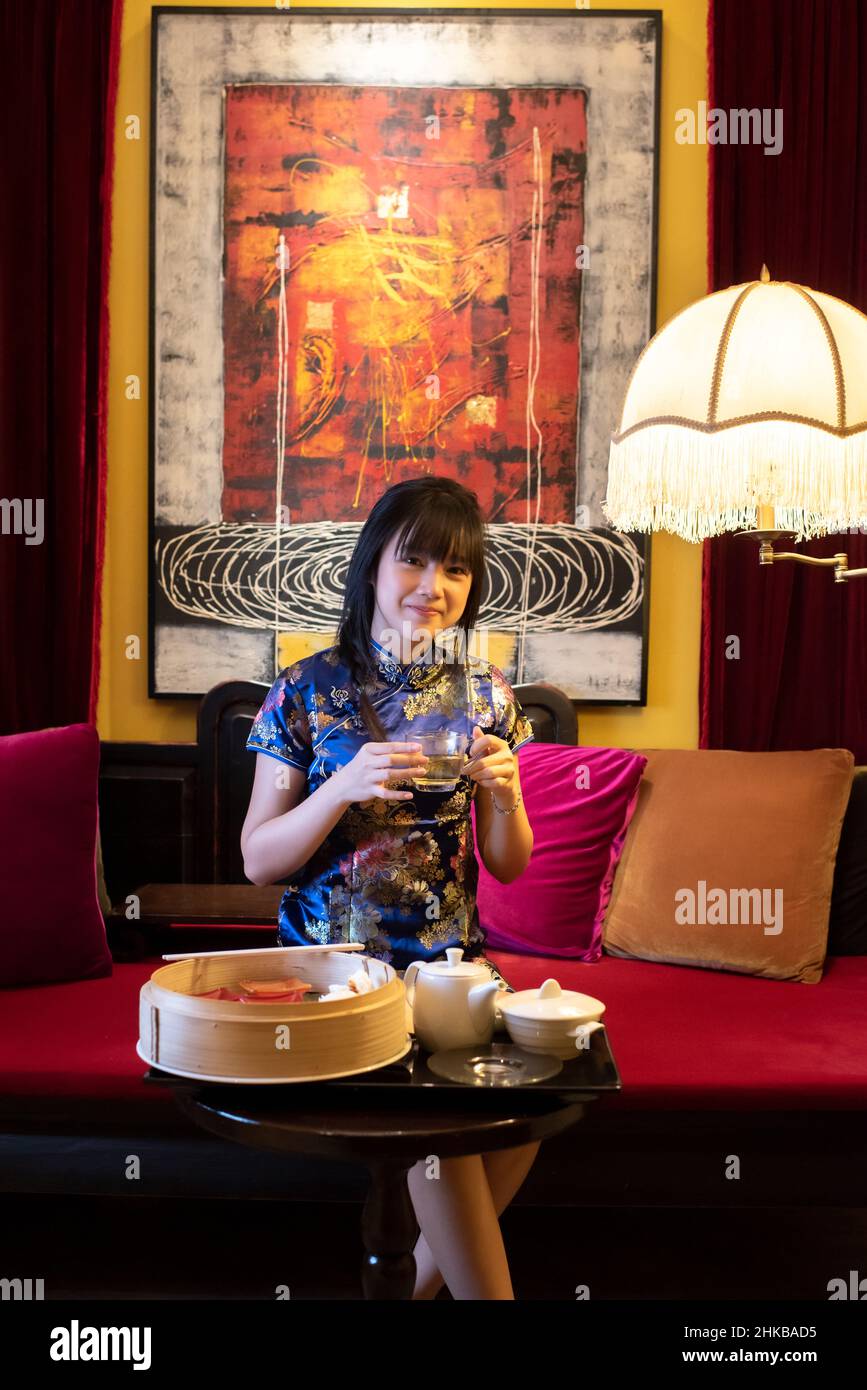 Teen girl drinking tea eating hi-res stock photography and images - Alamy