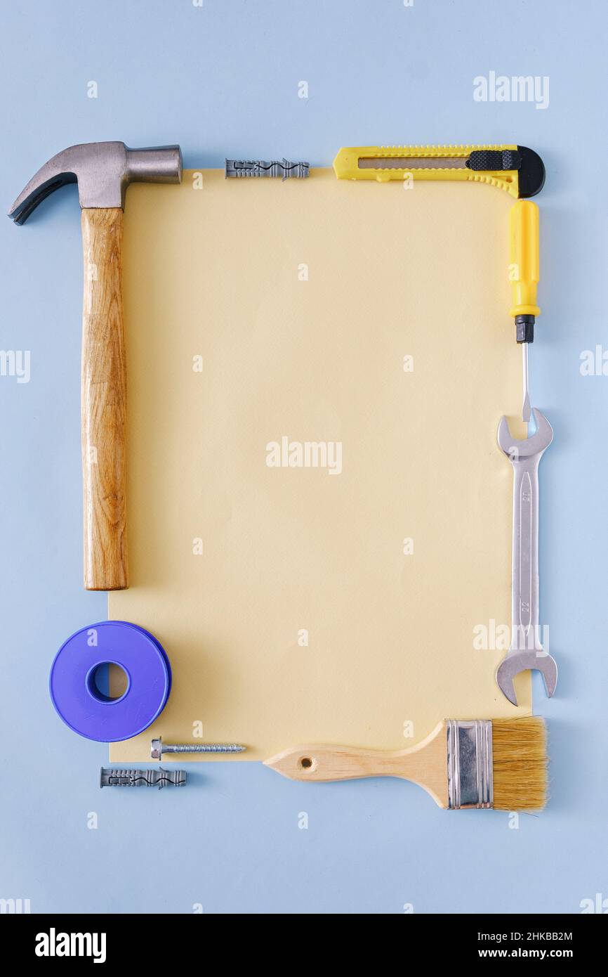 Border of DIY hardware surrounding a Border page of yellow paper with ...