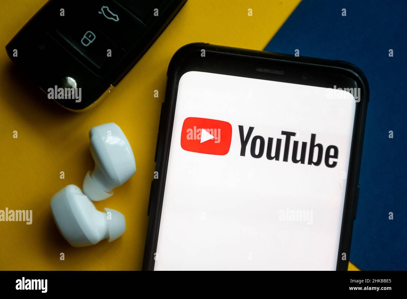 In this photo illustration a YouTube logo seen displayed on a smartphone. (Photo by Mateusz ...