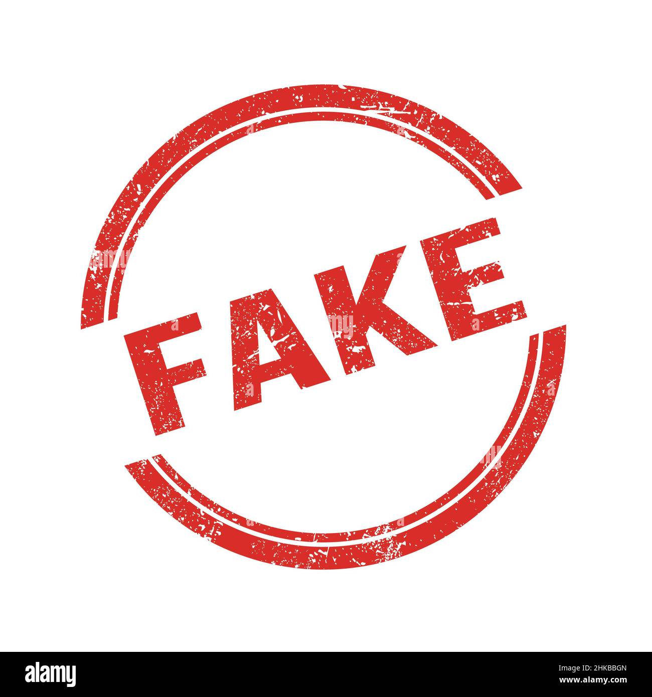 FAKE text written on red grungy vintage round stamp Stock Photo - Alamy