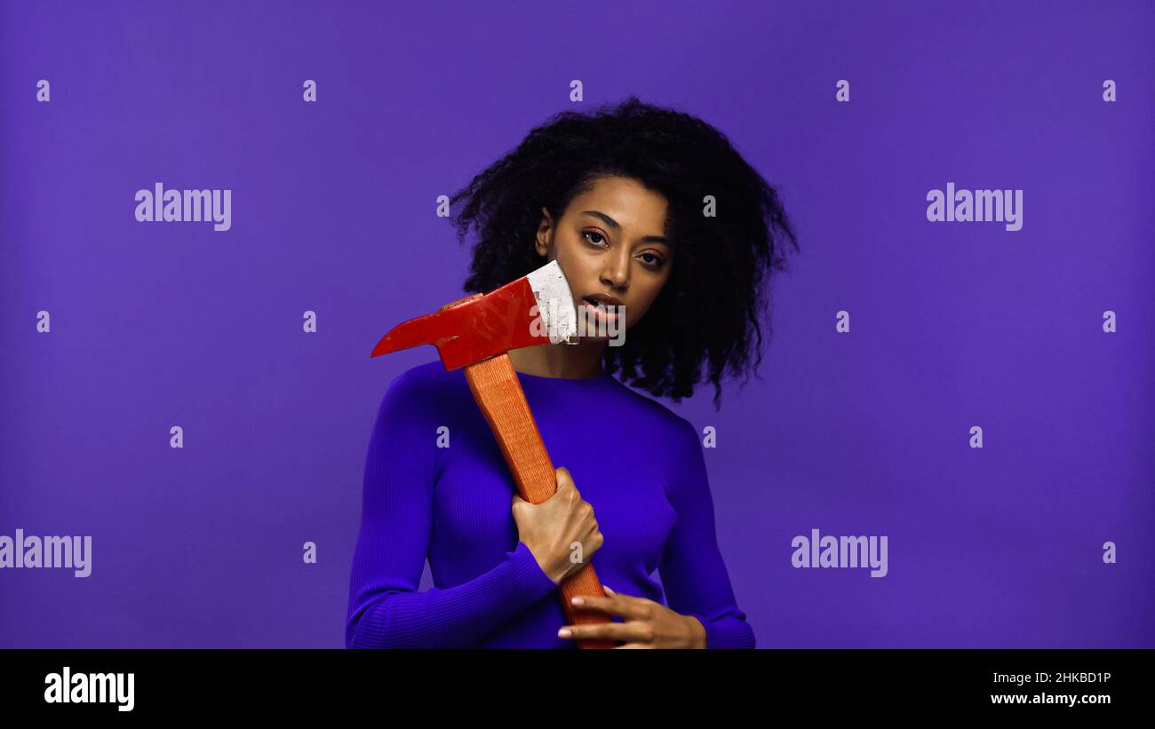 Attractive woman holding hammer hi-res stock photography and images - Alamy