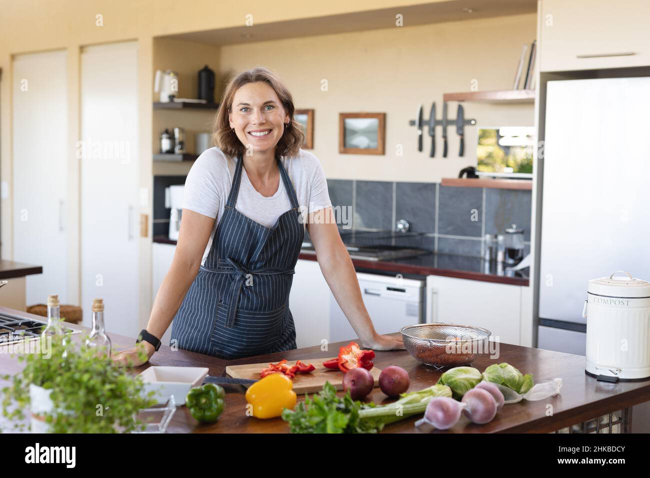 Woman wearing an apron hi-res stock photography and images - Alamy