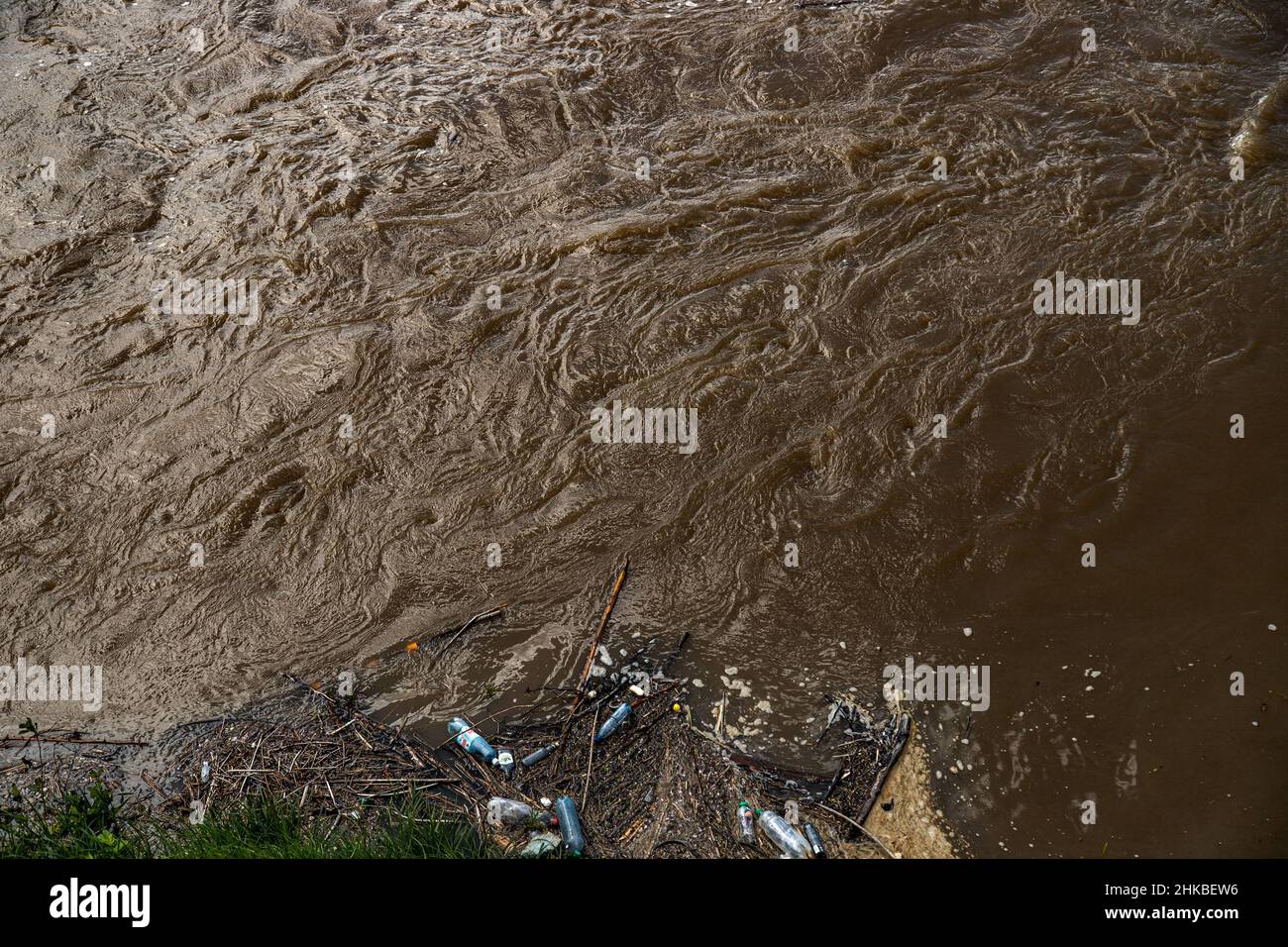 Garbage in polluted dirty river Stock Photo - Alamy