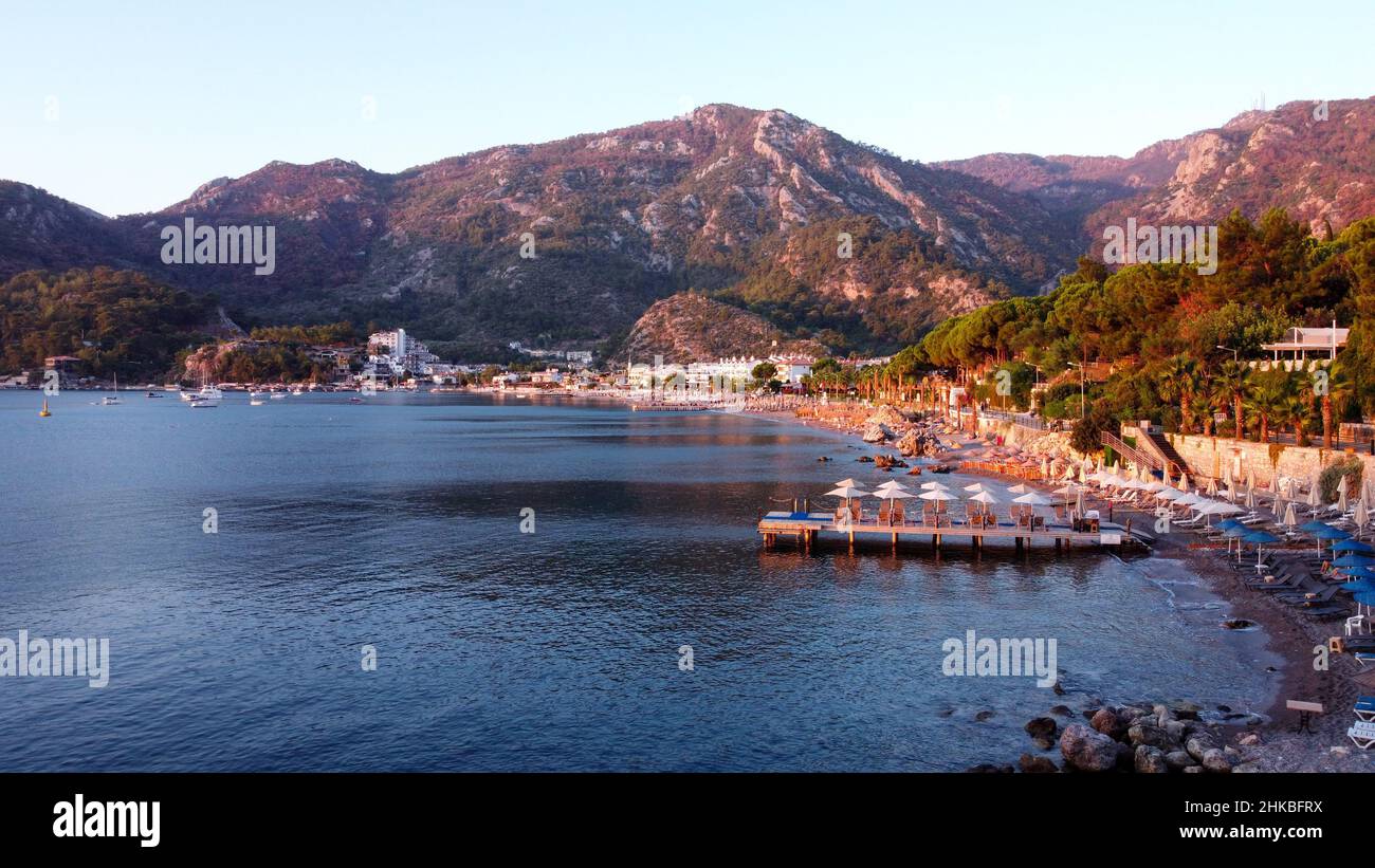 An aerial image of a beach in Turunc, Turkey. Sunrise over resort ...