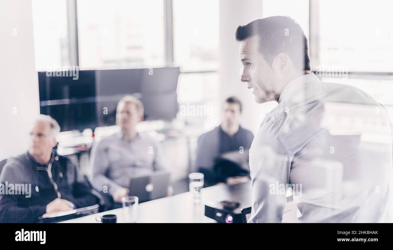 Business man making a presentation at office. Business executive ...