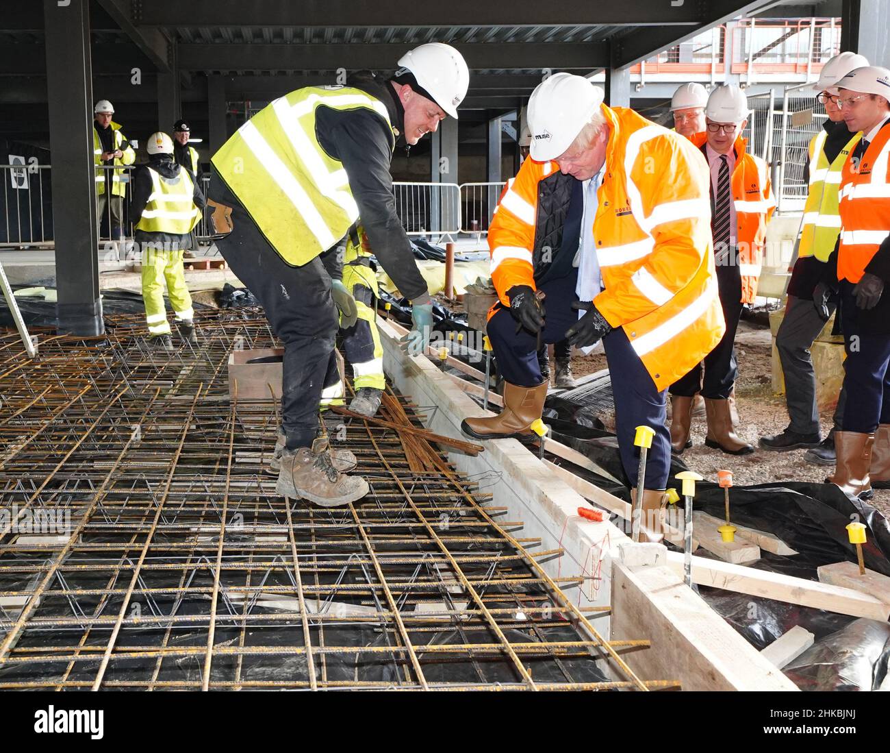 Prime Minister Boris Johnson is shown steel fixings for construction ...
