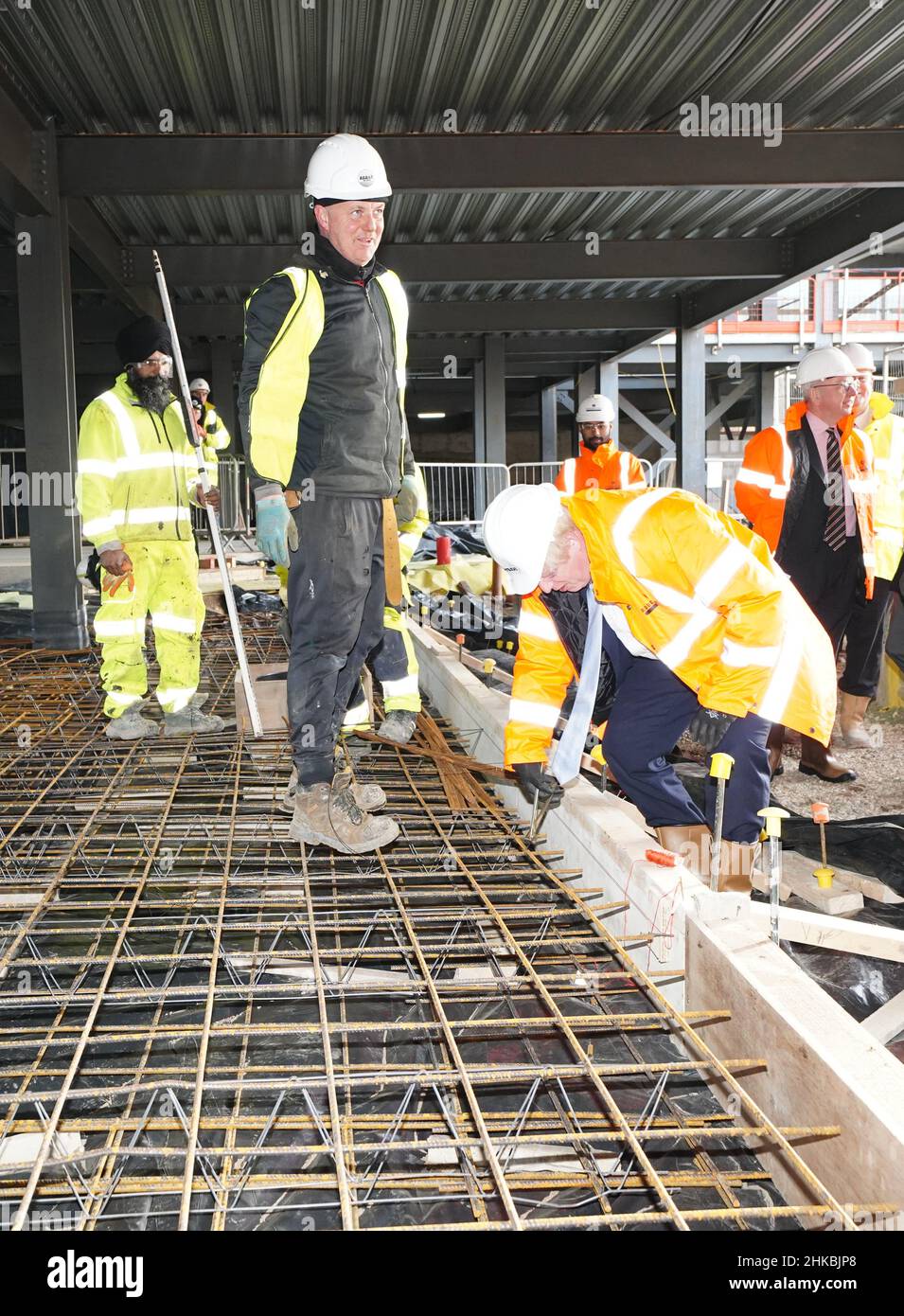 Prime Minister Boris Johnson is shown steel fixings for construction ...