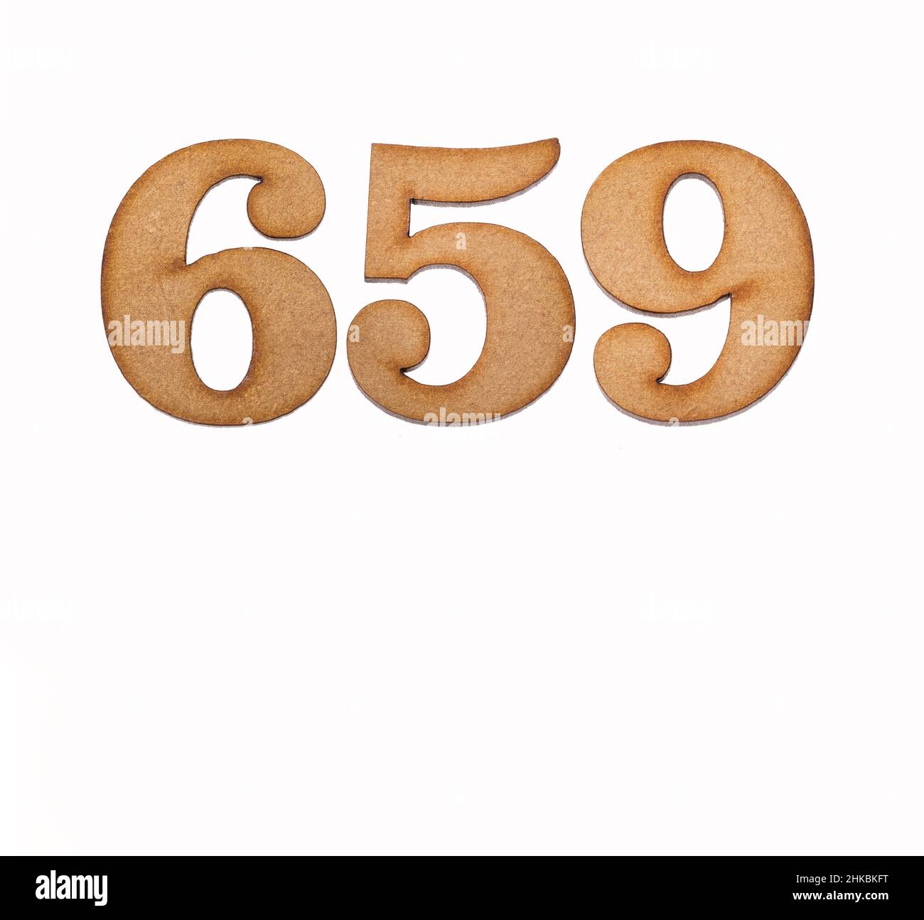 Number 659 in wood, isolated on white background Stock Photo - Alamy