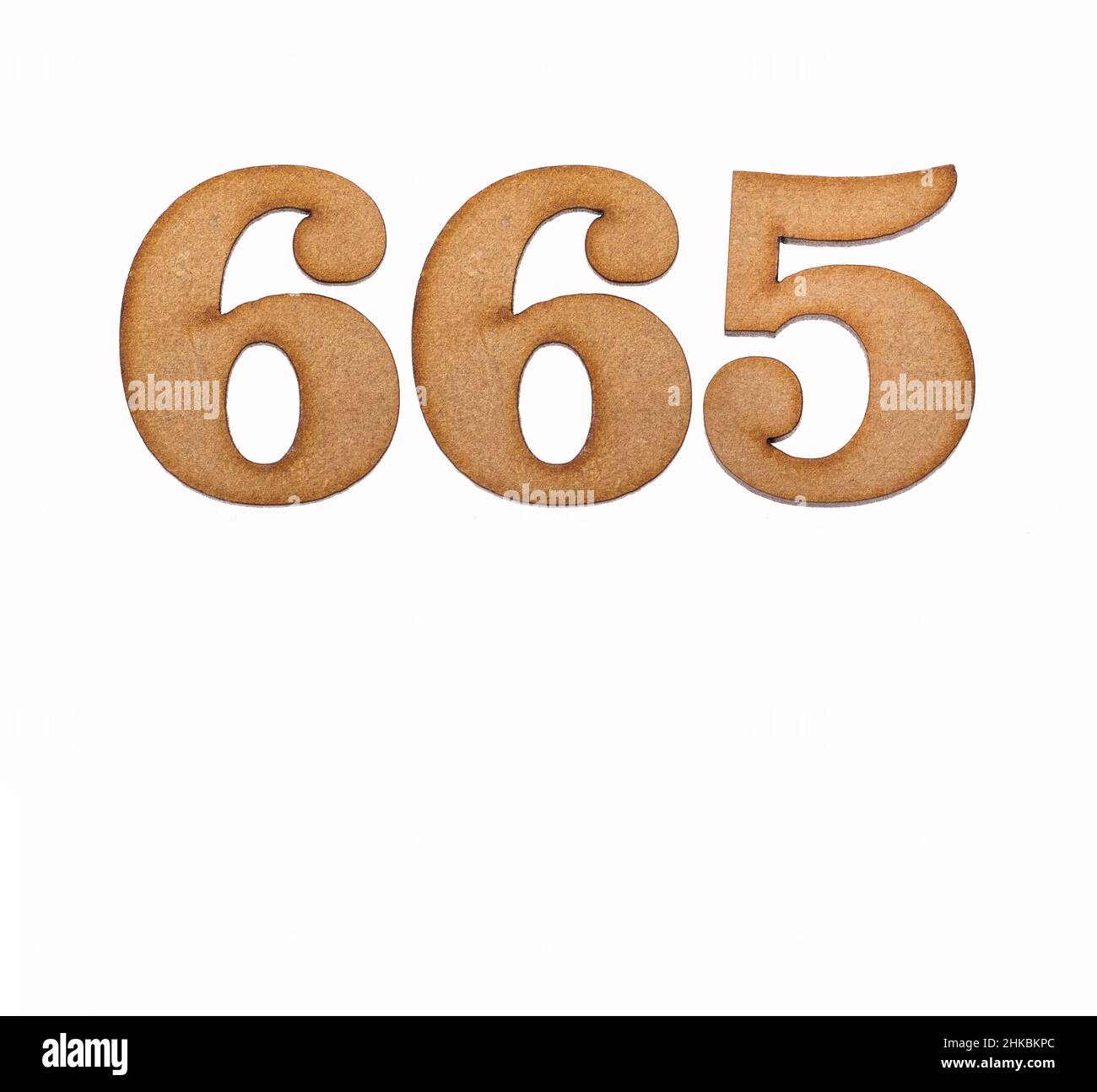 Number 665 in wood, isolated on white background Stock Photo - Alamy