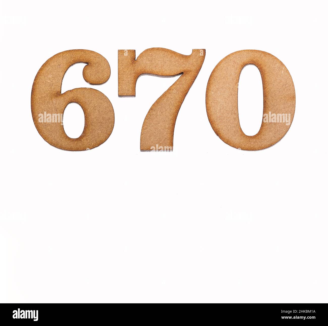 Number 670 - Piece of wood isolated on white background Stock Photo - Alamy