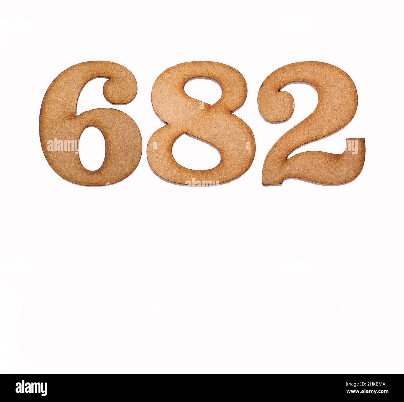 Number 682 - Piece of wood isolated on white background Stock Photo - Alamy