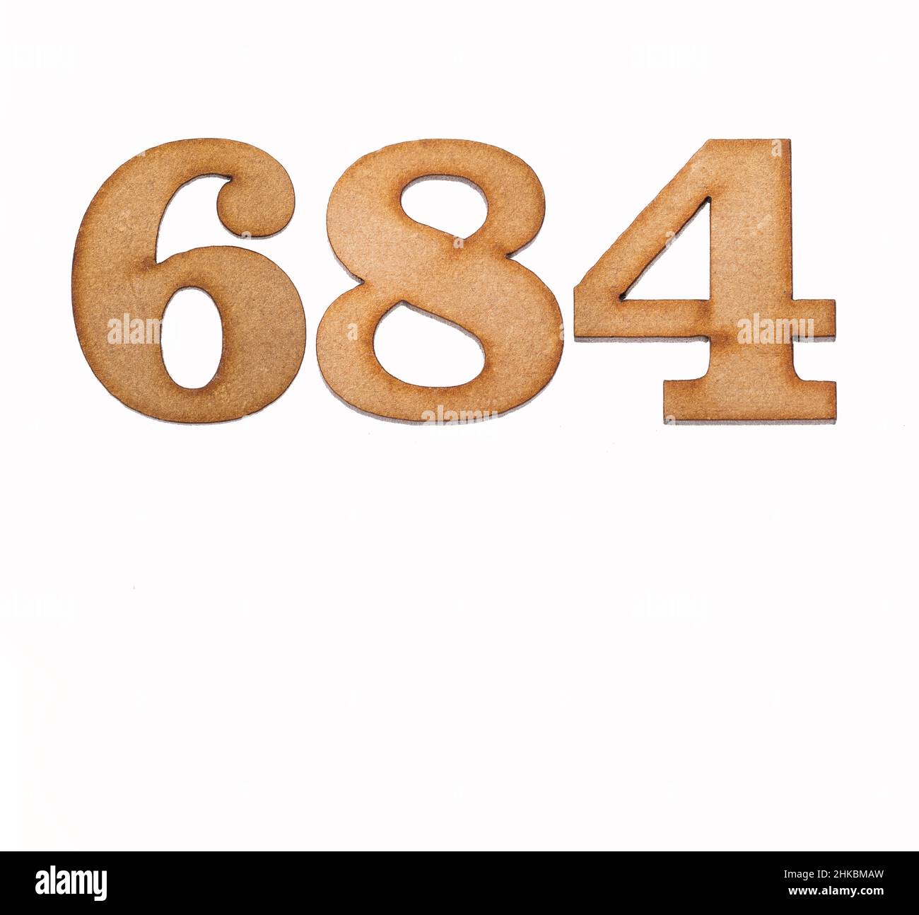 Number 684 - Piece of wood isolated on white background Stock Photo - Alamy