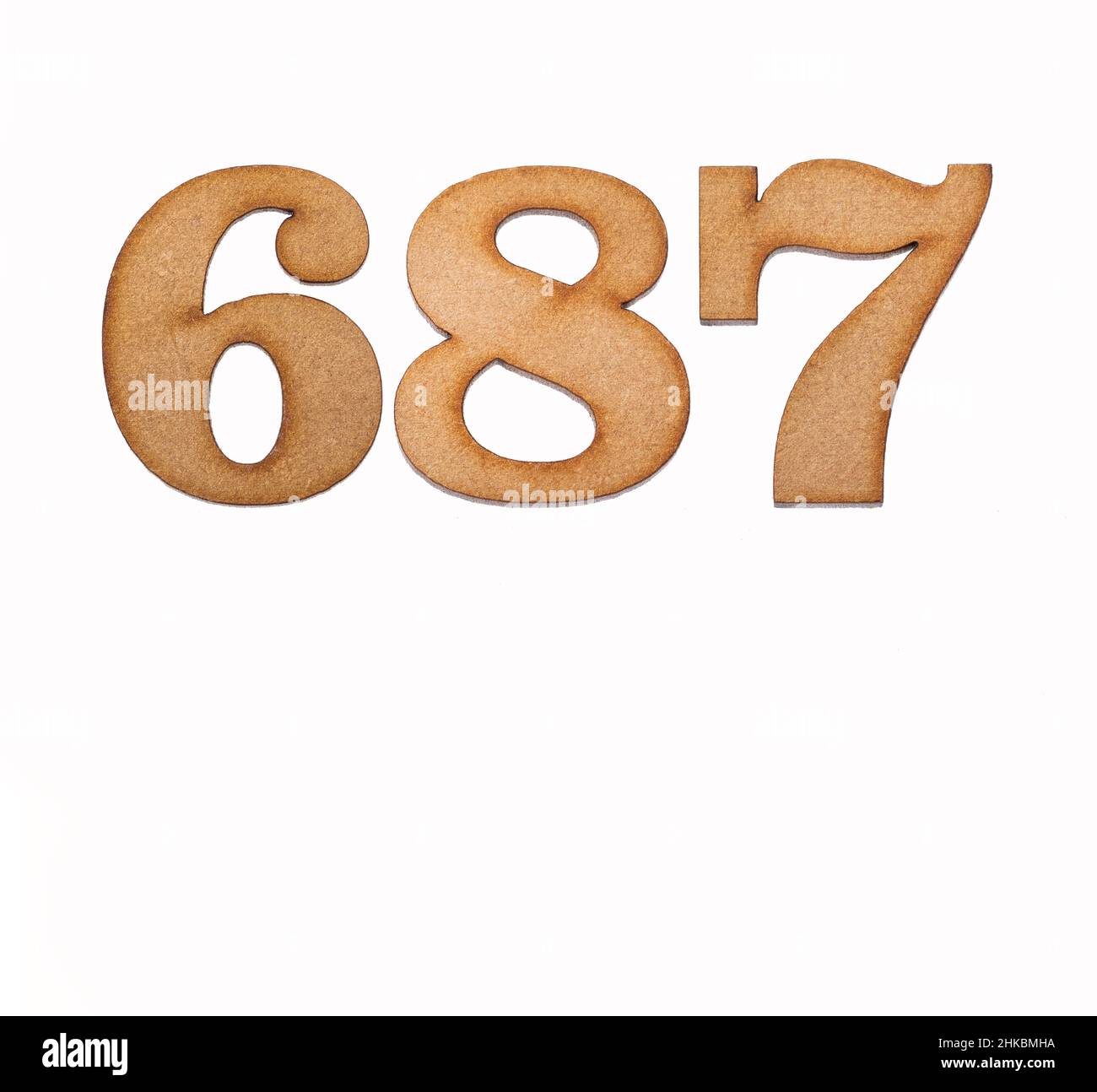 Number 687 in wood, isolated on white background Stock Photo - Alamy