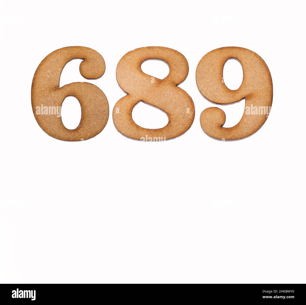 Number 689 in wood, isolated on white background Stock Photo - Alamy