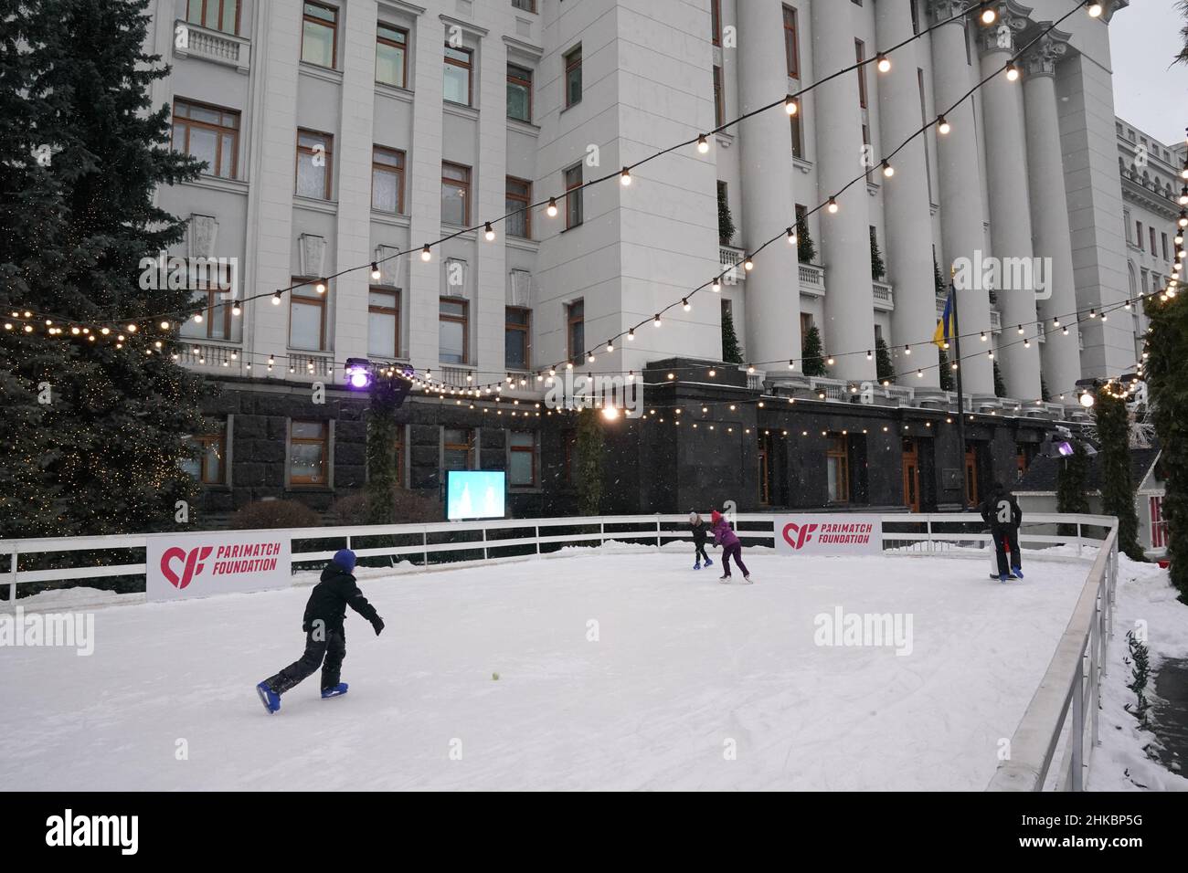 Kyiv, Ukraine. 3rd Feb, 2022. People ice skate in front of the Office ...