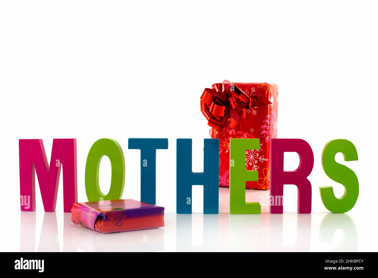 text for mothers day with presents on white background Stock Photo - Alamy