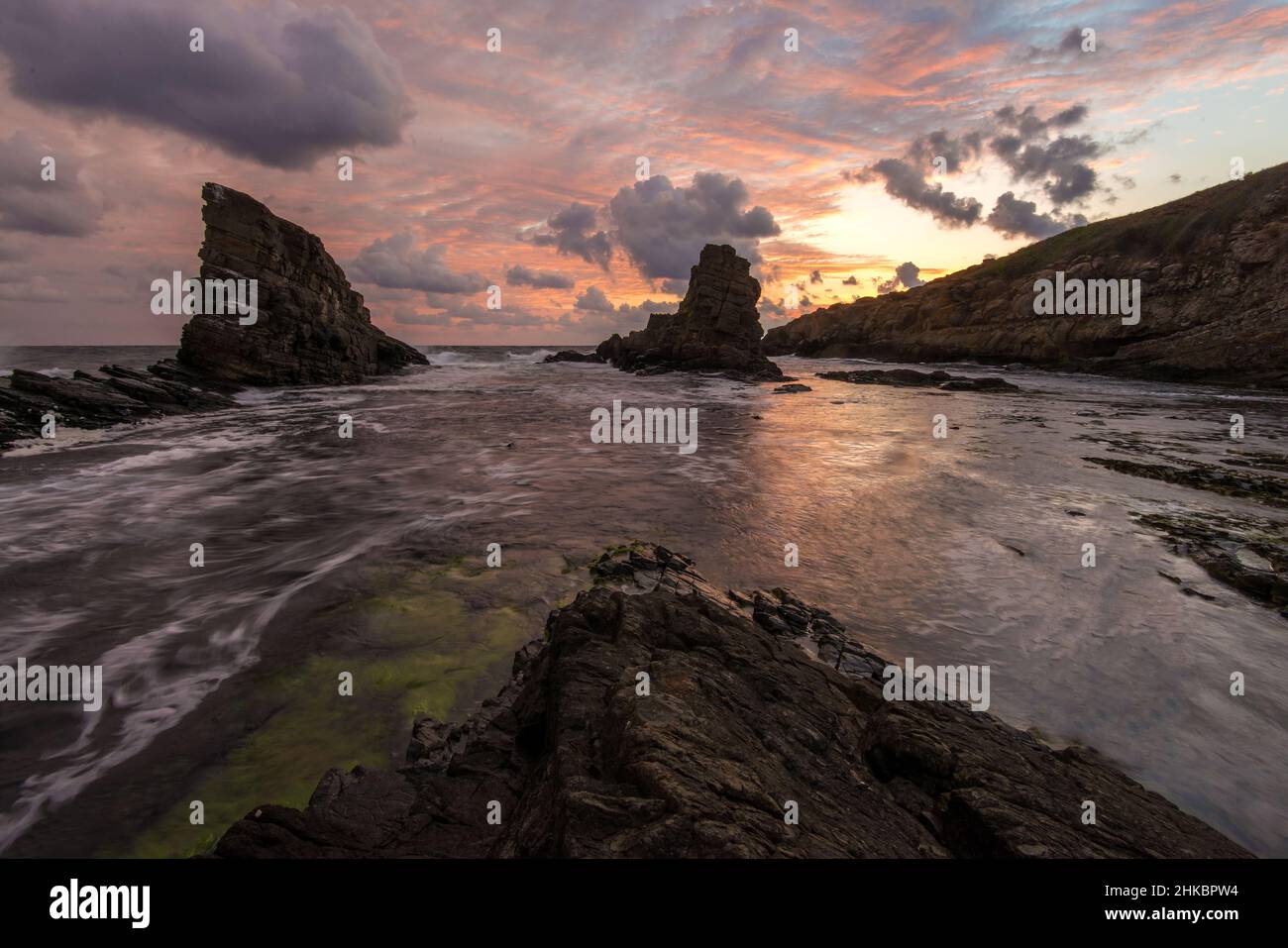 Seascape and magnificent dramatic sunrise over Rock formation The Ships ...