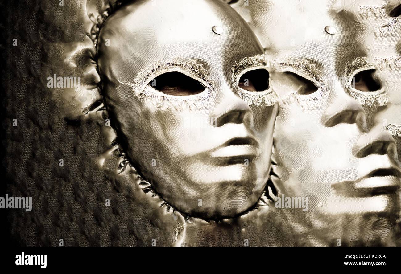 the eerie mask emerges from a gray steel wall Stock Photo - Alamy
