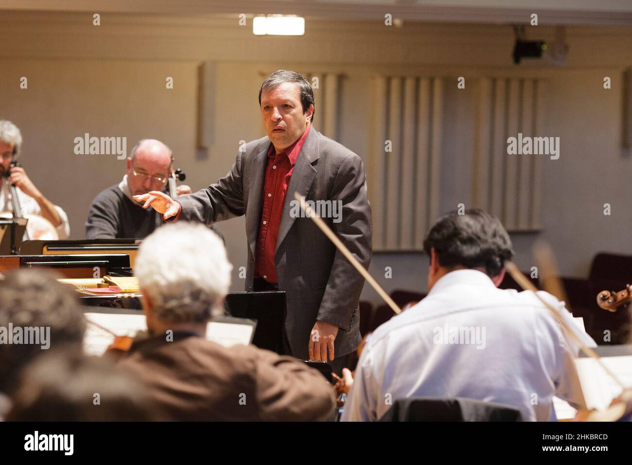 American pianist and conductor, Murray David Perahia, conducting a ...