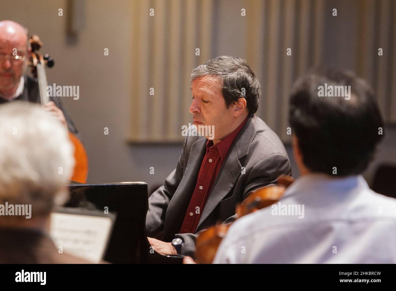 American pianist and conductor, Murray David Perahia, conducting a ...