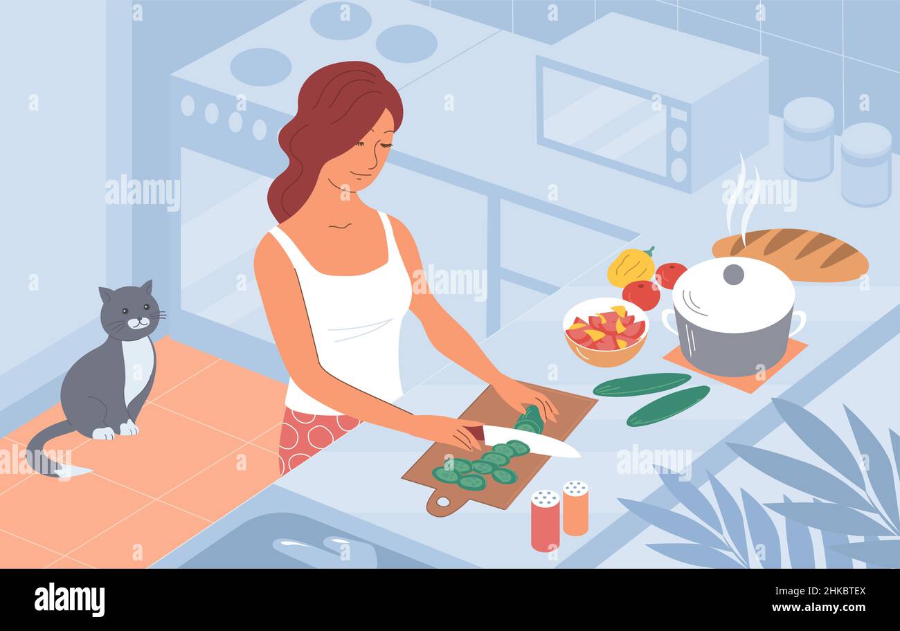 A young woman prepares a homemade dinner in the kitchen. Cuts vegetable ...